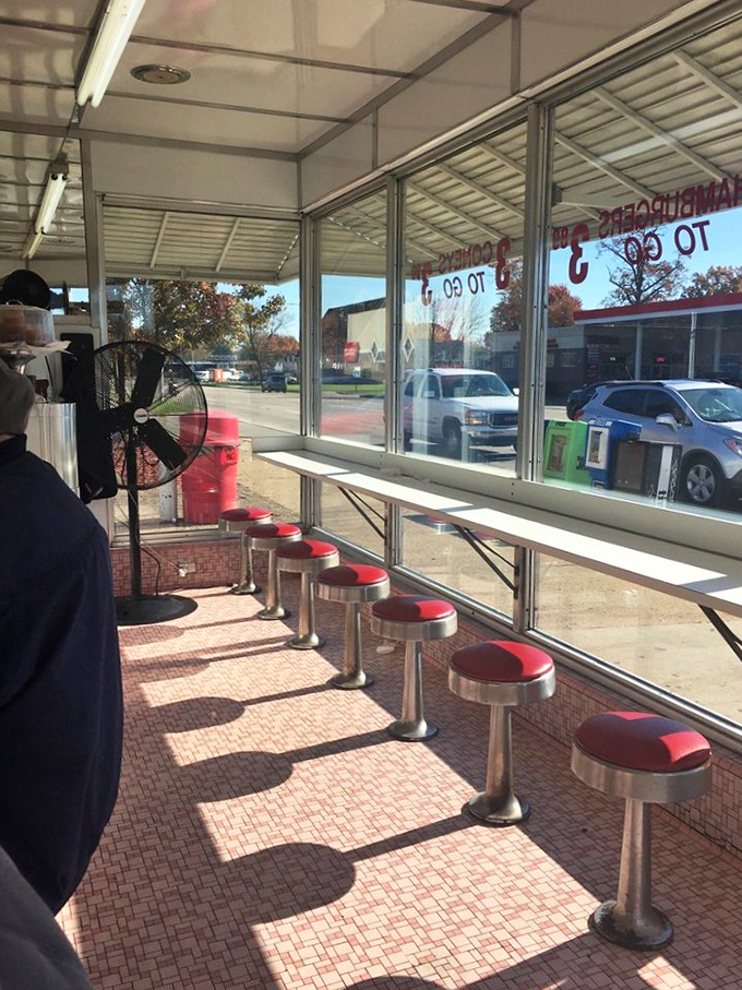 The counter seating offers front-row tickets to the best show in town: watching short-order cooks perform their choreographed culinary ballet.