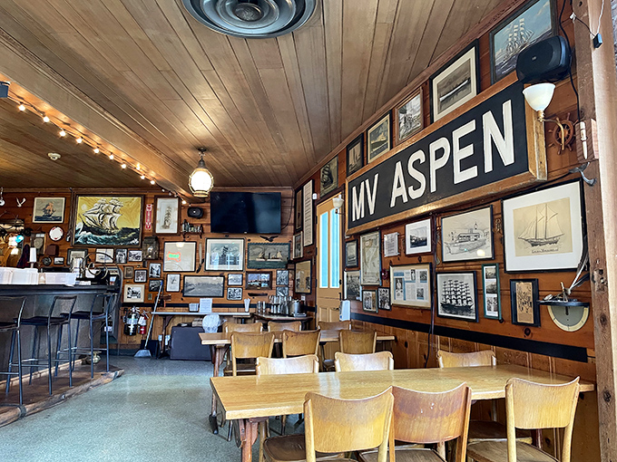 The "MY ASPEN" sign might be confusing in an oyster bar, but that's part of the charm—nautical décor collected over decades creates an authentically quirky atmosphere.