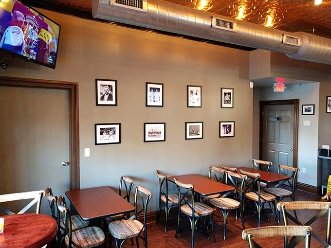 Simple wooden tables, framed photos, and the promise of good food. Sometimes atmosphere isn't about design; it's about anticipation.