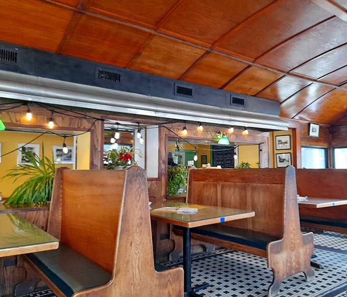 Warm wood tones, vintage lighting, and cozy booths create the perfect backdrop for conversations that flow as easily as the coffee refills.