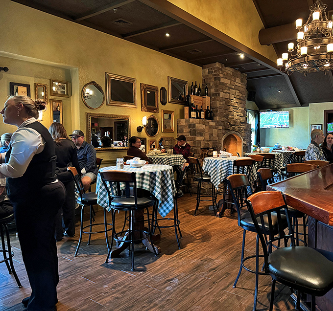 The stone fireplace and gallery wall create that perfect "I've arrived somewhere special" feeling. Comfort and elegance slow dance in perfect harmony.