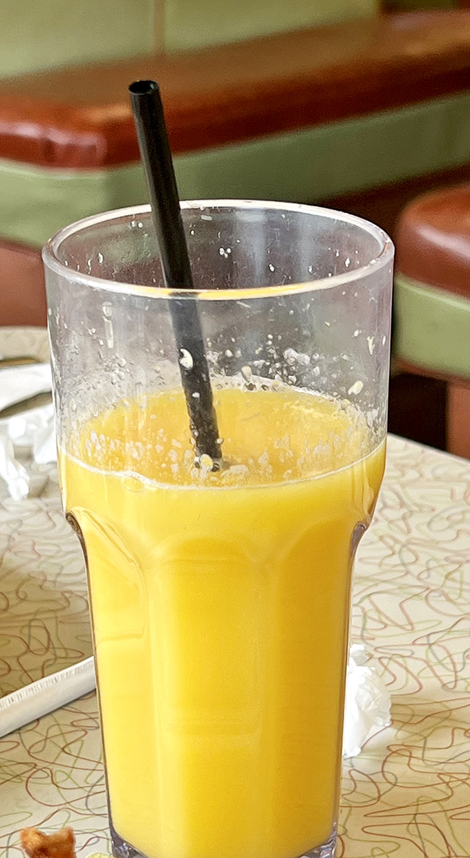 Morning sunshine in a glass. This orange juice probably remembers when "going viral" meant calling your neighbors about a good recipe.