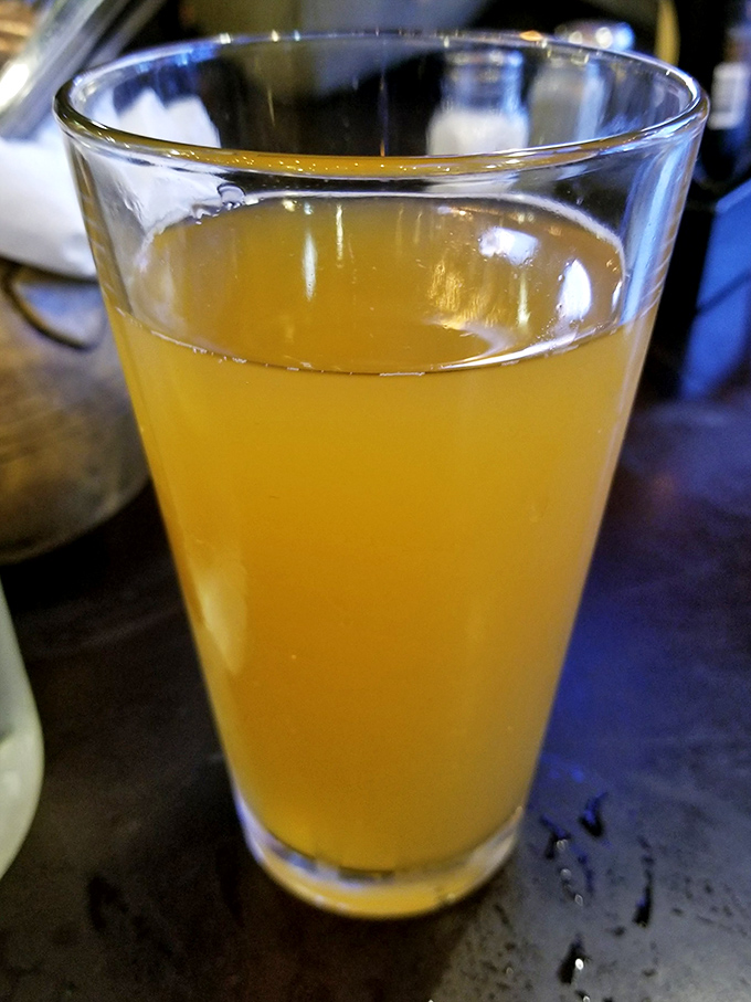 That golden elixir isn't just a beverage &ndash; it's the perfect palate cleanser between bites of smoky, saucy perfection.