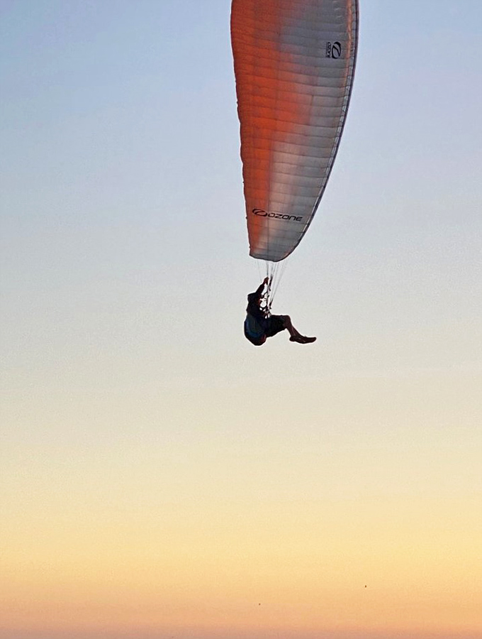 The kind of paragliding view that makes you question all your life choices that didn't lead to soaring above Laguna Beach.
