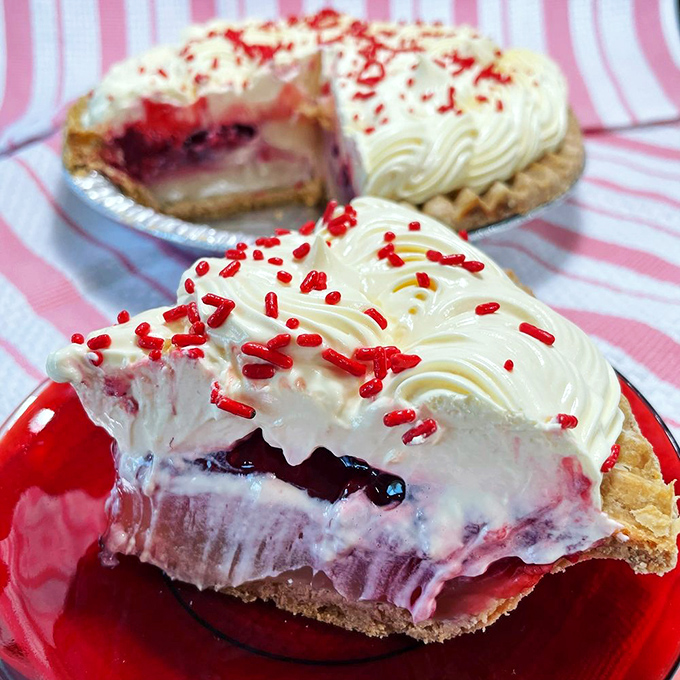 Layer upon layer of creamy, fruity bliss topped with festive sprinkles. This isn't just dessert&mdash;it's a celebration on a plate.