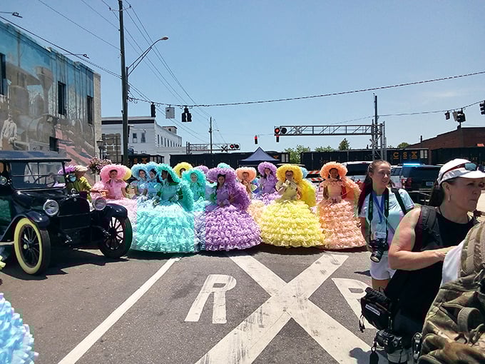 Colorful dresses brighten a local parade, showcasing the free entertainment that fills Brewton's community calendar throughout the year.
