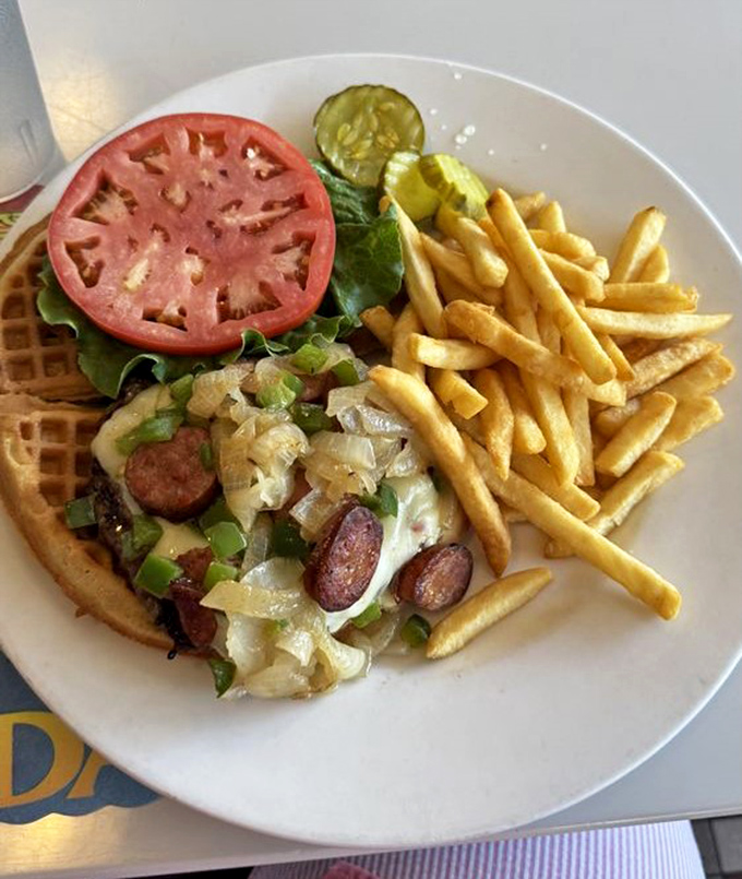 This waffle burger breaks all the rules of conventional sandwich construction, and we're absolutely here for this delicious act of culinary rebellion.