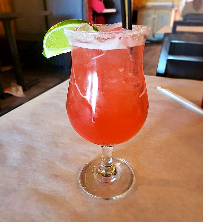 A salt-rimmed margarita with lime &ndash; the perfect cooling counterpoint to the spicy seafood feast that awaits.