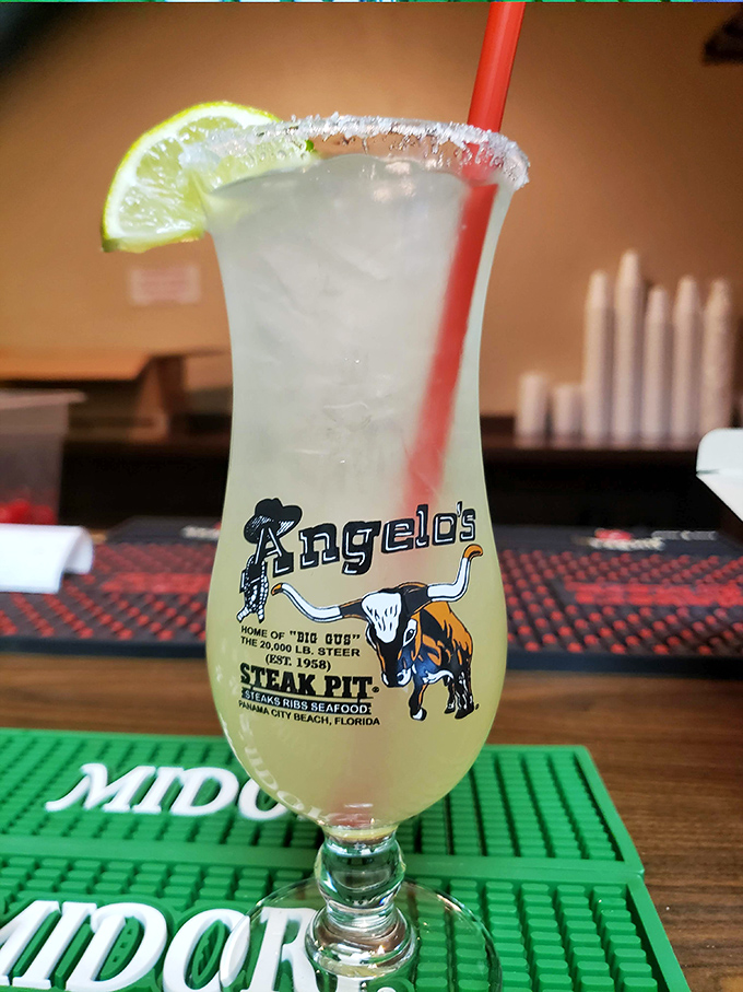 A salt-rimmed margarita that captures Florida sunshine in liquid form, complete with the restaurant's iconic bull mascot.