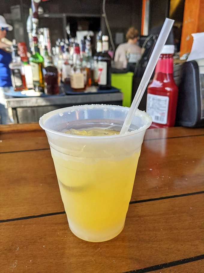 Nothing complements lake views like a frosty margarita. The salt rim isn't just garnish &ndash; it's essential seasoning for your afternoon relaxation.