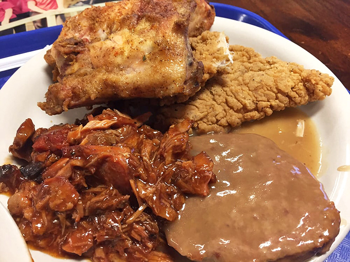 Fried chicken so golden it could win beauty pageants, served alongside barbecue that's been sauced with serious intention and skill.