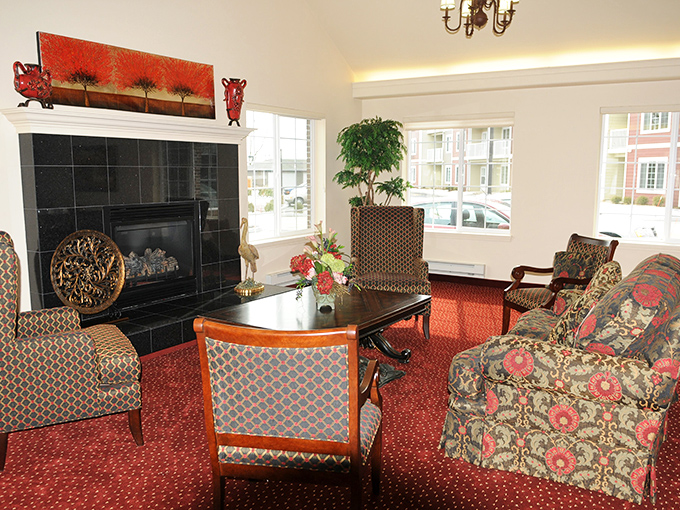 Where conversations flow as easily as the natural light. This cozy gathering space proves retirement is about adding comfort, not compromising on it.