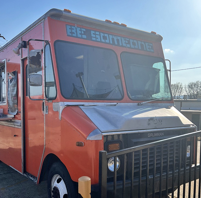 The bright orange food truck brings "BC Sammies" to hungry locals, proving that good food doesn't require white tablecloths or complicated reservations.