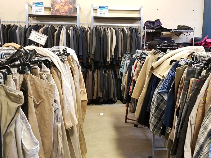 The men's section: where yesterday's business casual becomes tomorrow's vintage find. These khakis have stories to tell.
