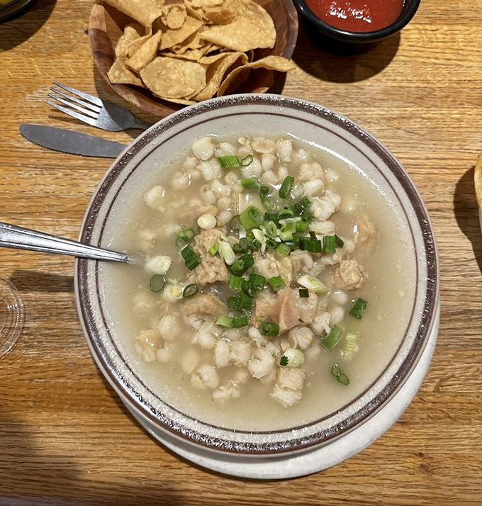 Menudo: the legendary Mexican cure-all that transforms simple hominy and tripe into a soul-warming elixir that laughs in the face of hangovers.