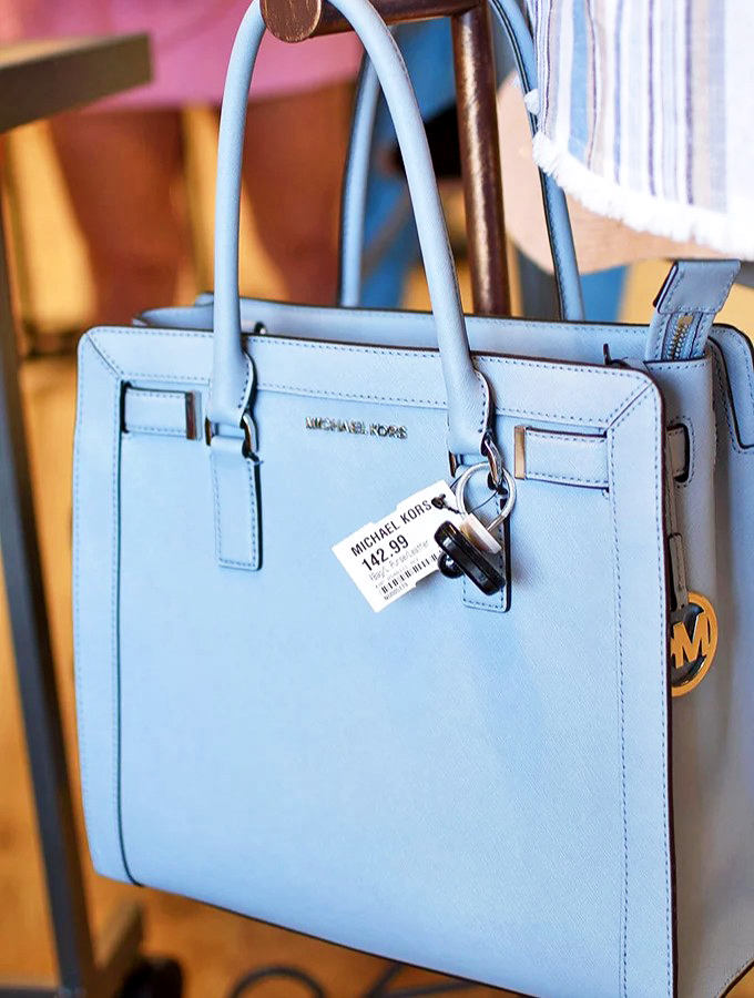 That perfect shade of blue doesn't come along every day. This Michael Kors bag whispers "investment piece" while your wallet sighs with relief. 