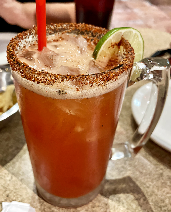 A michelada with its tajin-crusted rim and lime garnish&mdash;part cocktail, part appetizer, all delicious. Beer has never looked so dressed up.