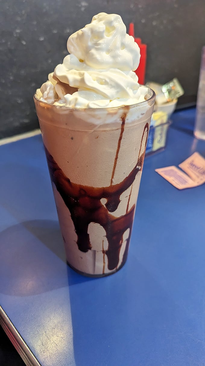 This isn't just a milkshake—it's dessert in a glass, topped with enough whipped cream to make your inner child do a happy dance.