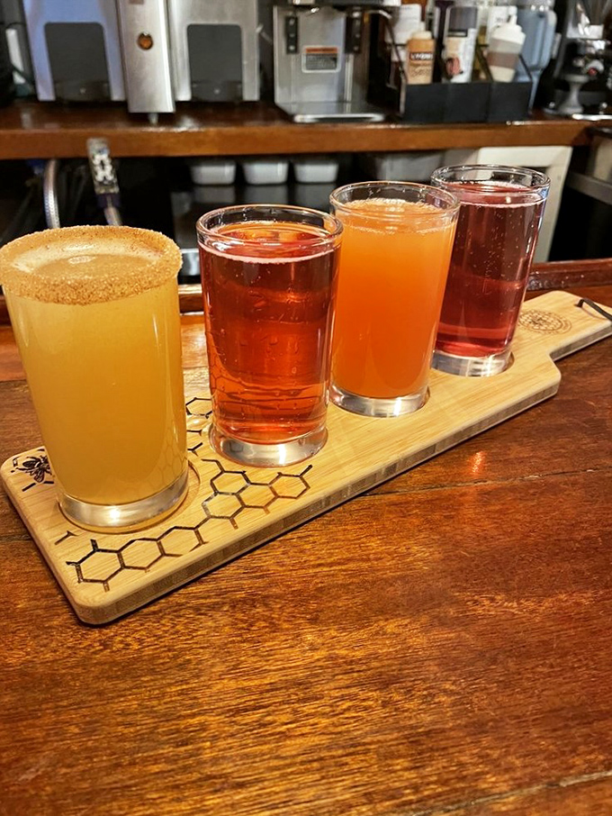 A mimosa flight that turns brunch into a celebration. The honeycomb-patterned board is a subtle reminder that yes, you're at The Bee and The Biscuit.