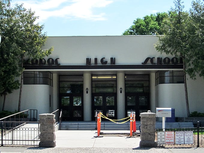 Modoc High School's Art Deco entrance stands as a monument to education in rural America. Those columns have witnessed generations of small-town dreams taking flight.