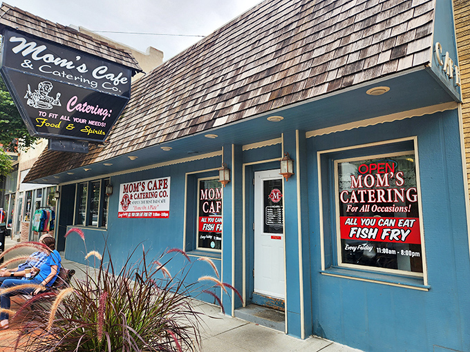 Mom's Cafe serves up comfort food with a side of nostalgia in a blue building that stands out like a friendly wink among the historic brick facades.