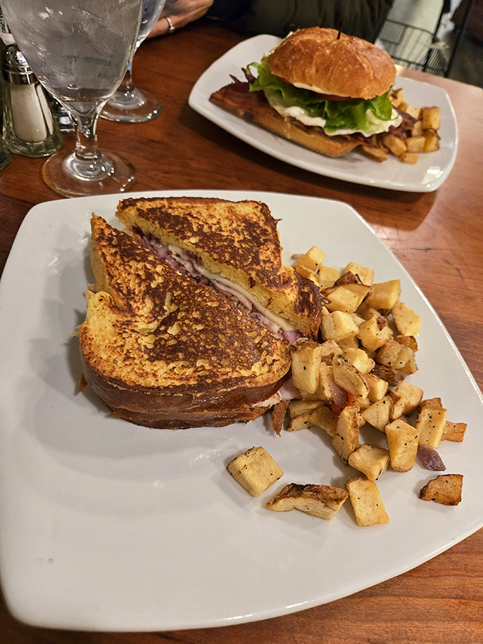 The Monte Cristo: where breakfast and lunch collide in a golden-grilled masterpiece that makes you wonder why we ever separated the two meals.