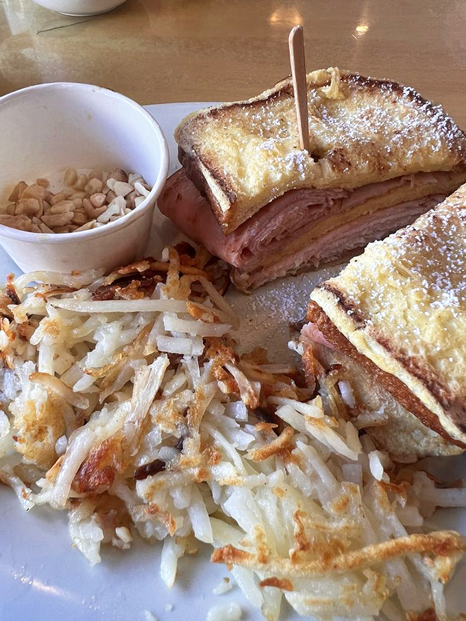 The Monte Cristo: French toast meets ham and cheese in a powdered sugar love affair. It's breakfast, it's lunch, it's dessert&mdash;it's everything.