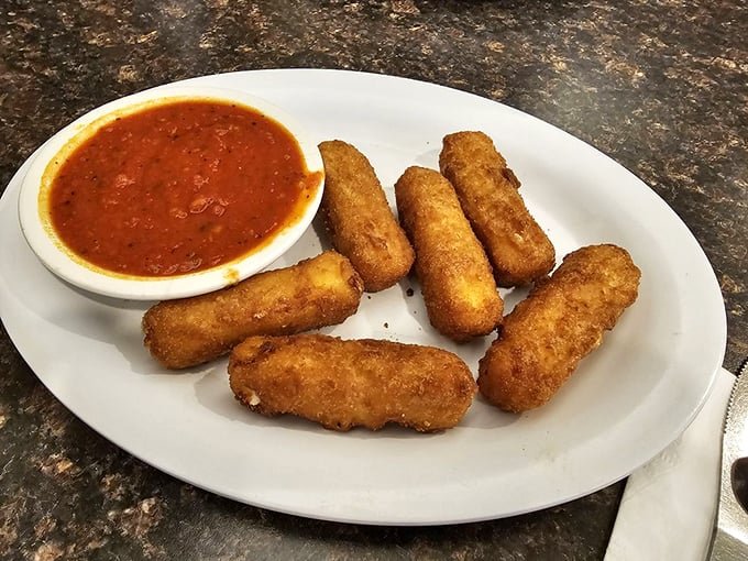 Mozzarella sticks &ndash; golden-armored soldiers of cheese, standing at attention beside their marinara dipping pool, awaiting your command.