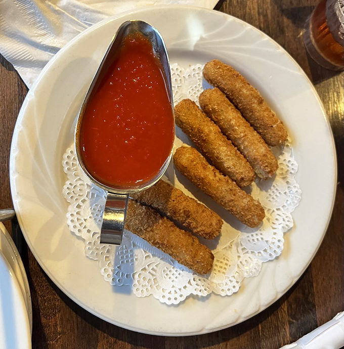 Mozzarella sticks that actually taste like cheese, not just breading. That marinara sauce is practically begging for a skinny-dipping session.