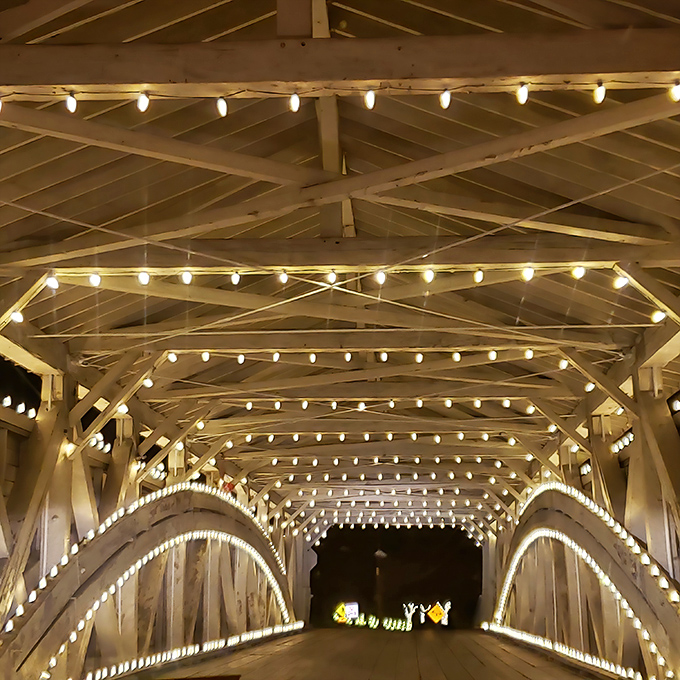 When evening falls, the bridge transforms into a magical tunnel of light. Thomas Kinkade couldn't have painted it more enchantingly. 