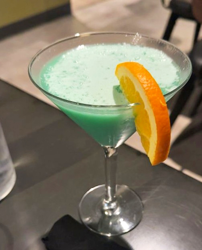 A North Beach Cooler that looks like the Caribbean Sea in a glass—the perfect liquid vacation after a day exploring South Haven.