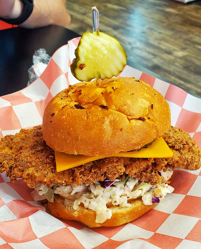 Another sandwich masterpiece with cheese melting like a sunset over crispy chicken. That brioche bun deserves its own fan club.