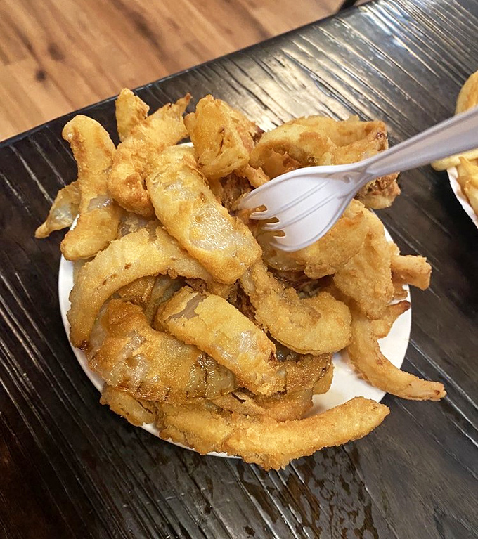 Crispy, golden onion rings that shatter with each bite&mdash;the unsung heroes of the Rutt's Hut side dish lineup.