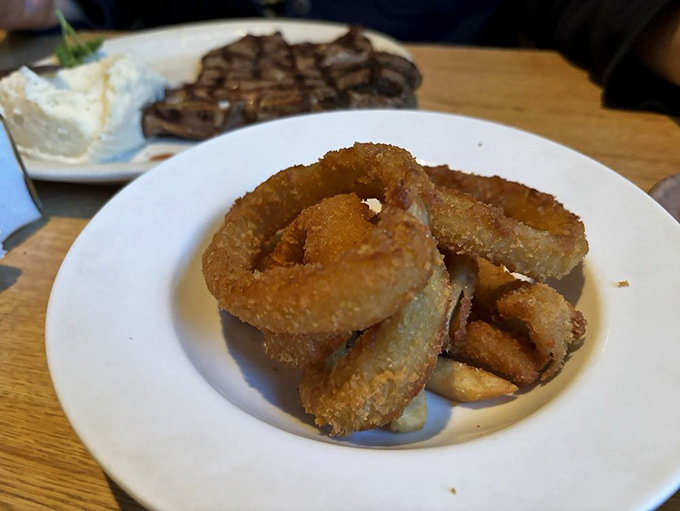 Onion rings with that perfect crunch-to-softness ratio. These golden halos make those fancy truffle-oil versions seem unnecessarily complicated.