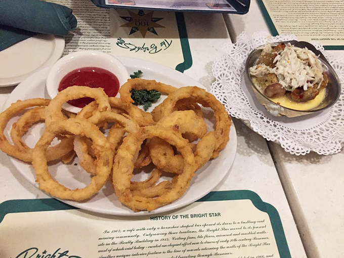 Onion rings so perfectly golden and crisp they deserve their own display case at the Smithsonian's comfort food exhibit.