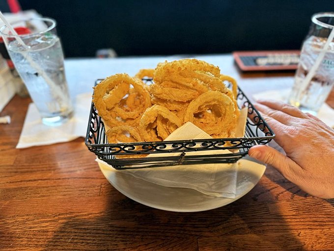 Onion rings engineered for maximum crunch&mdash;the perfect golden circles that make you wonder why anyone bothers with lesser side dishes.