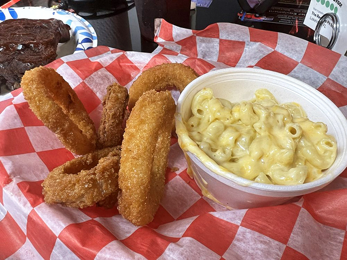 Onion rings with the perfect crunch-to-give ratio, alongside mac and cheese that's clearly never met a powdered mix in its creamy life.