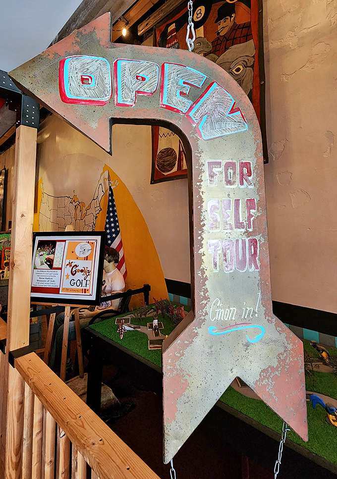 "OPEN FOR SELF TOUR" invites the vintage sign, promising quirky discoveries inside this roadside attraction that celebrates the art of going big.
