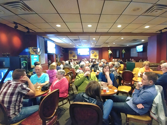 Full house, full hearts. The bustling dining area shows why reservations are recommended at this beloved Wisconsin institution.