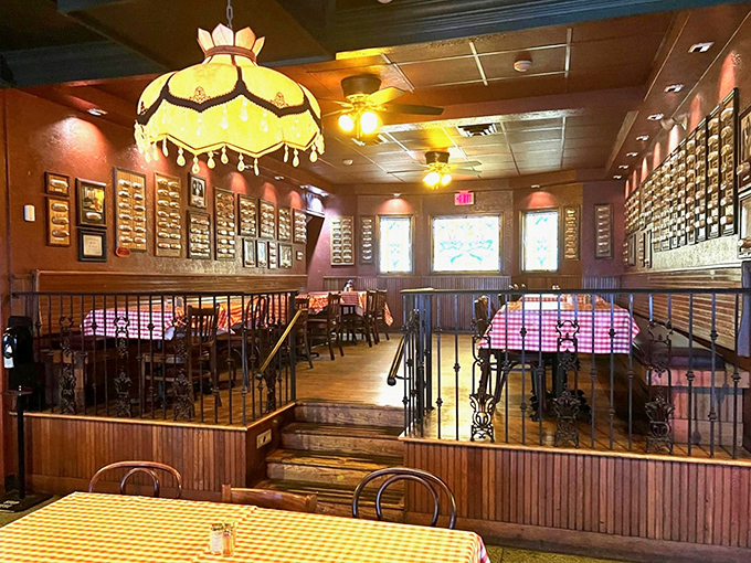 The warm glow of vintage-style lamps illuminates walls covered with signed hot dog buns&mdash;Toledo's unique version of Hollywood's Walk of Fame.