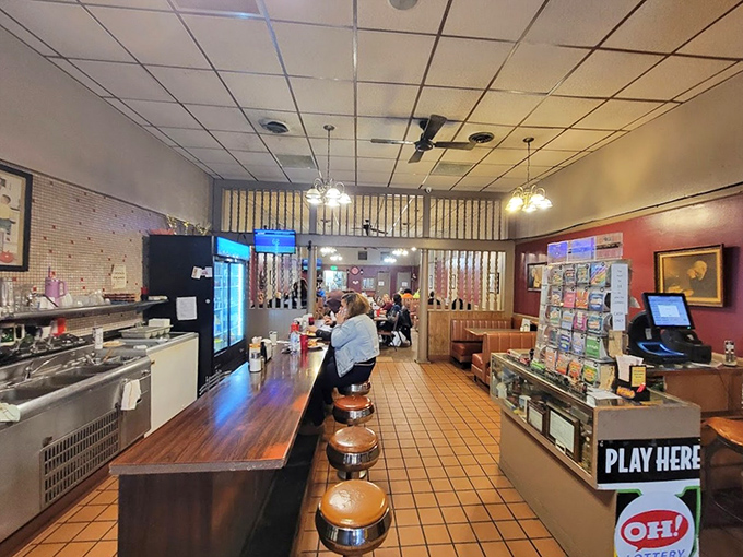 The counter view reveals the heart of the operation&mdash;where magic happens between grill and plate without unnecessary fanfare.