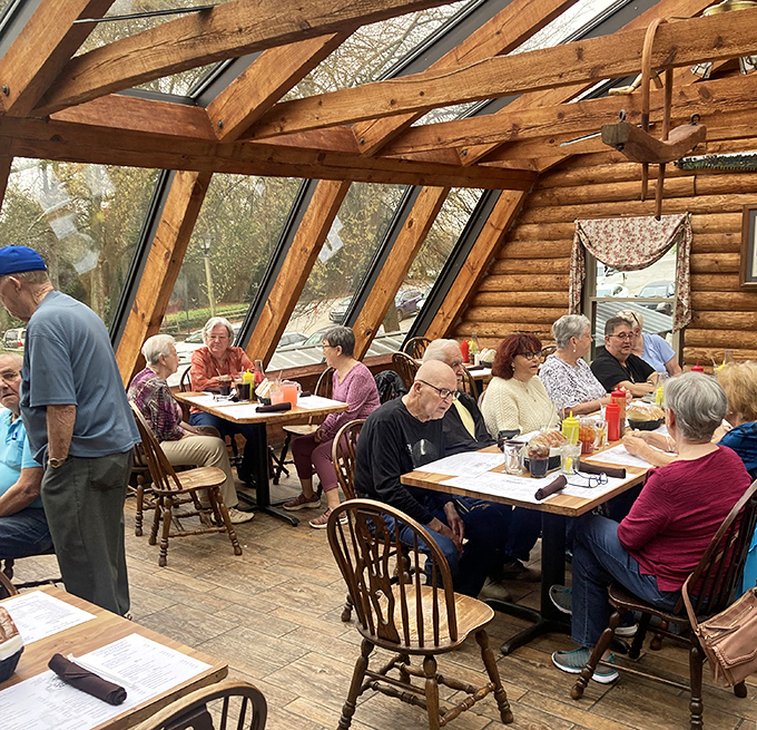 Sunlight streams through windows in this dining area, creating the perfect ambiance for contemplating the serious business of barbecue consumption.
