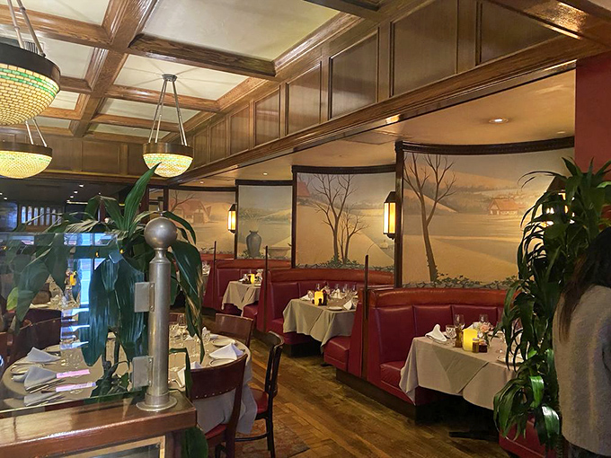Each dining room offers its own character, with murals and red leather booths creating an atmosphere that whispers, "Important meals happen here."