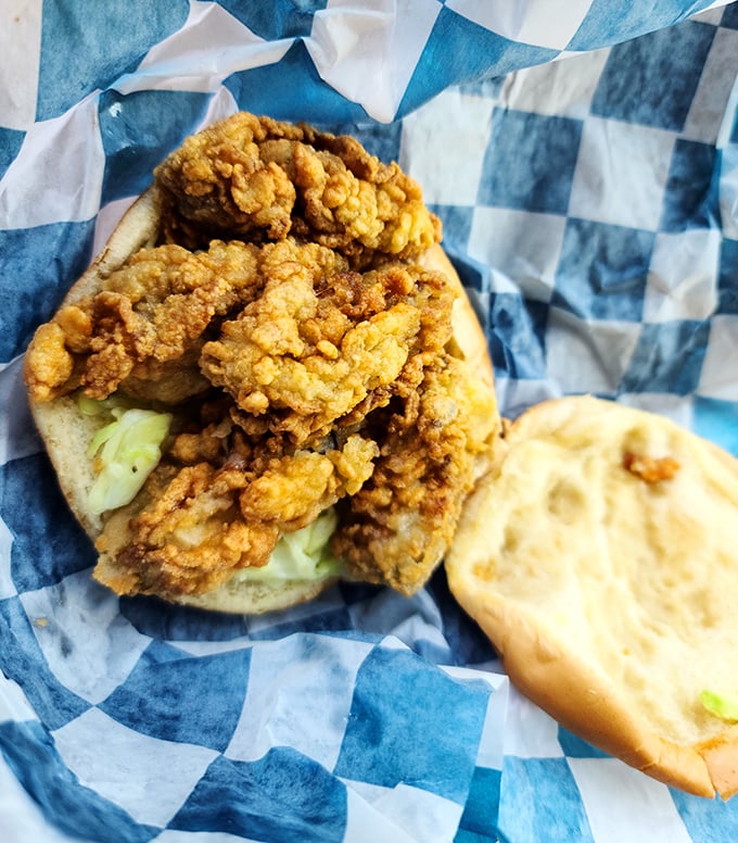 The oyster burger &ndash; where land meets sea in a handheld miracle. Briny, crispy, and utterly addictive.