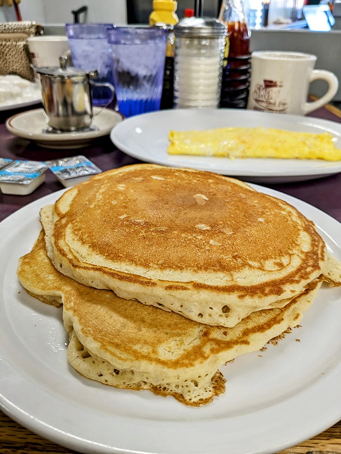 Pancakes so fluffy they could double as pillows. The perfect canvas for rivers of syrup and butter&mdash;breakfast architecture at its finest. 