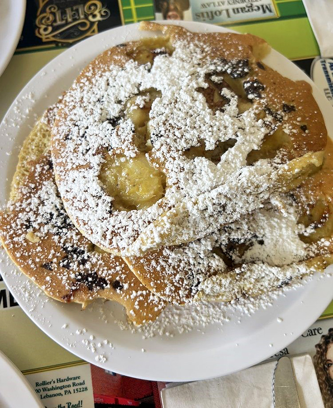 These pancakes don't just have powdered sugar&mdash;they're wearing delicious formal attire for their grand entrance to your taste buds.