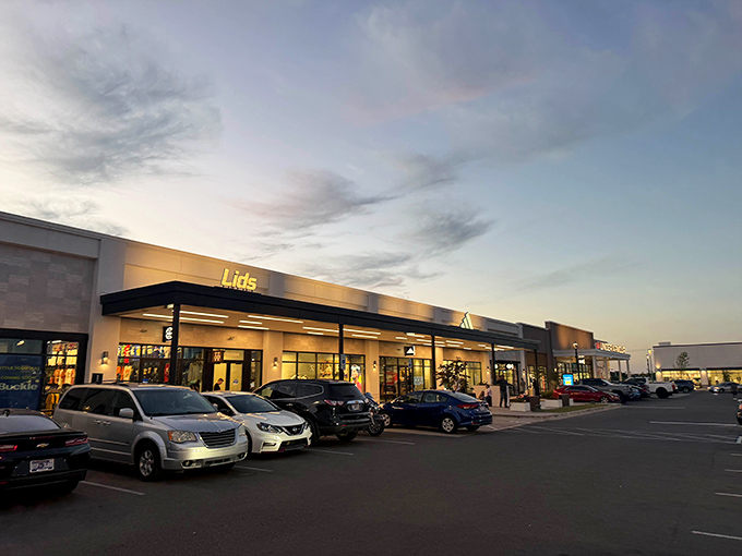 Even the parking areas maintain that clean, modern aesthetic. Lids and neighboring shops beckon with promises of headwear that won't break the bank.