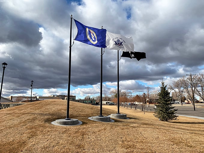 Patriot Field's flags stand proud against Idaho's dramatic sky, a reminder of the values that small-town America holds dear.