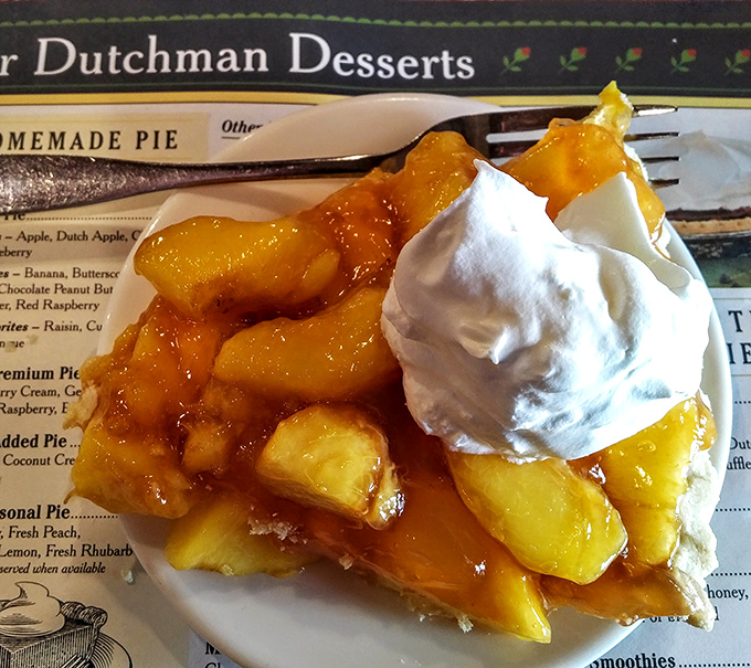 This isn't just peach pie&mdash;it's summer captured in a dessert, topped with ice cream melting like snowflakes on a warm Ohio afternoon.