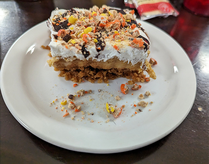 This isn't just dessert, it's therapy on a plate. Layers of sweet comfort topped with enough candy to make your dentist wince.